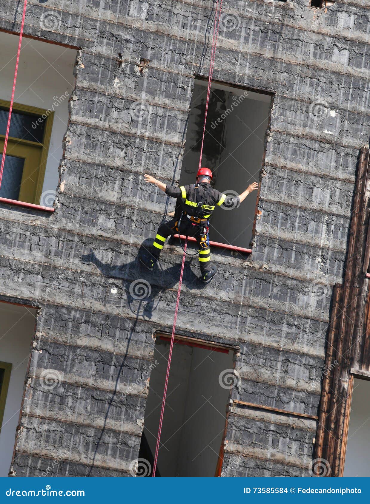 Climber of Firefighters Rappelling the Wall during the Fire Drill Stock ...