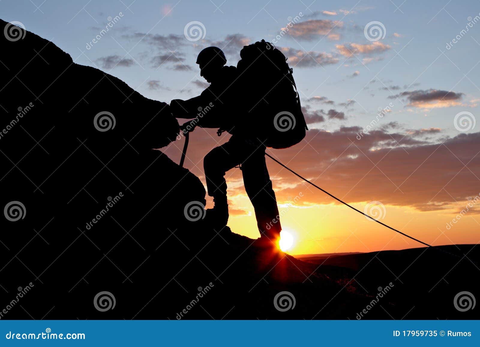 The Climber Goes Uphill on Sunset S Background Stock Image - Image of ...