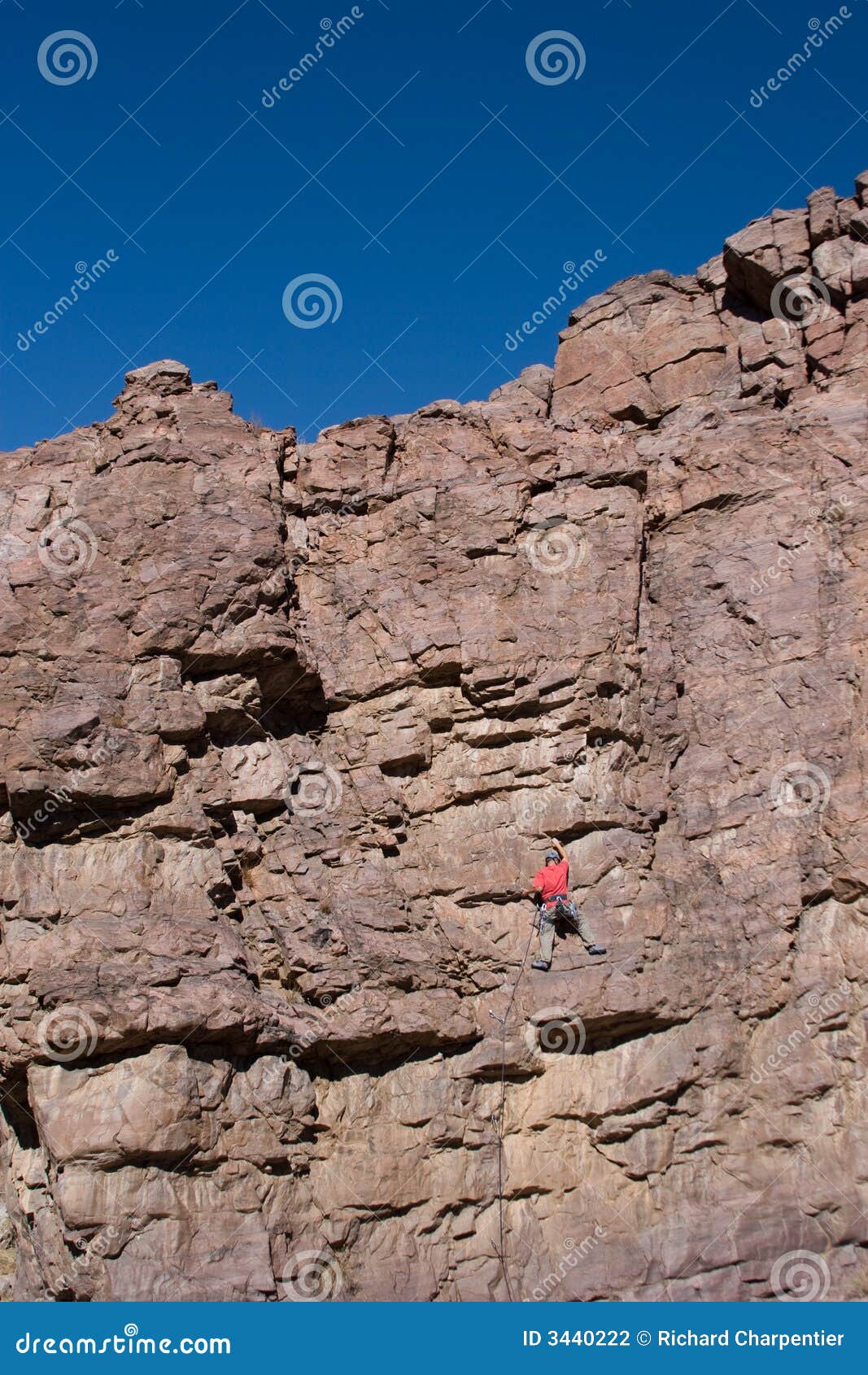 Climber halfway up cliff stock photo. Image of america - 3440222
