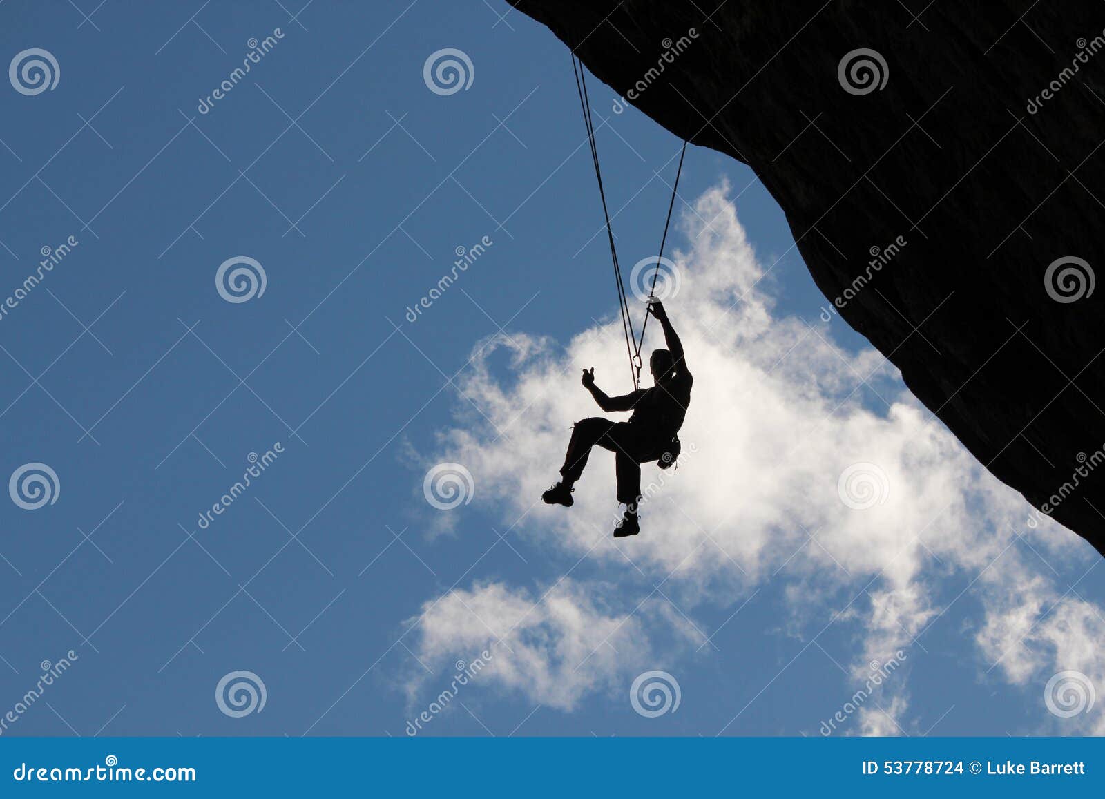 Climber hanging from rope stock photo. Image of cliff - 53778724