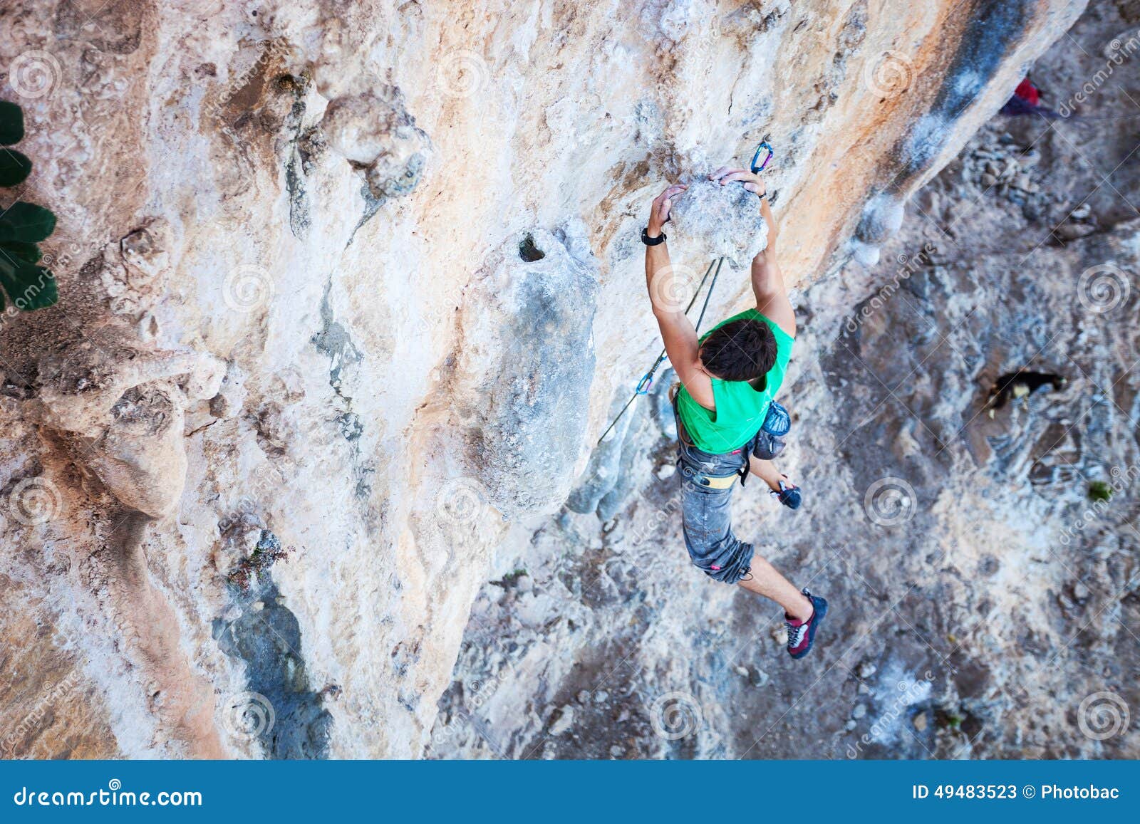 Climber Holding on Handhold while Climbing Cliff Stock Image - Image of ...