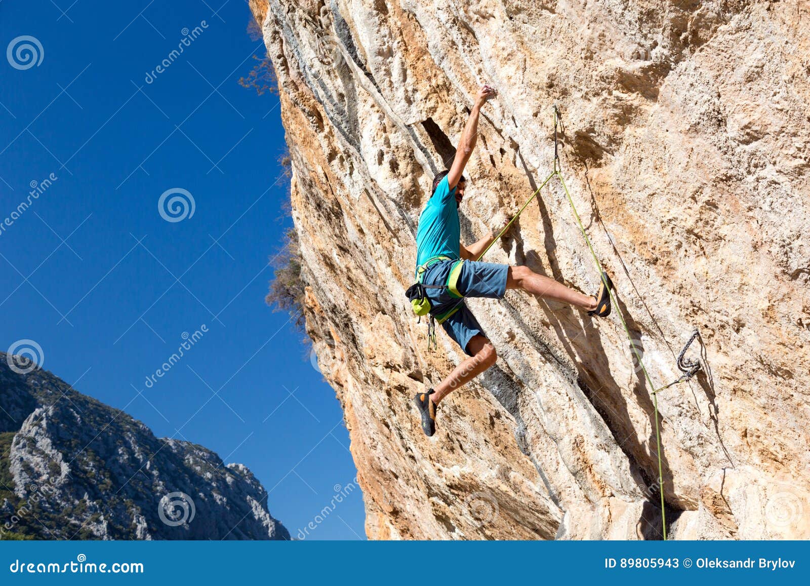 Climber Making Risky Move on Dangerous Rock Stock Image - Image of ...