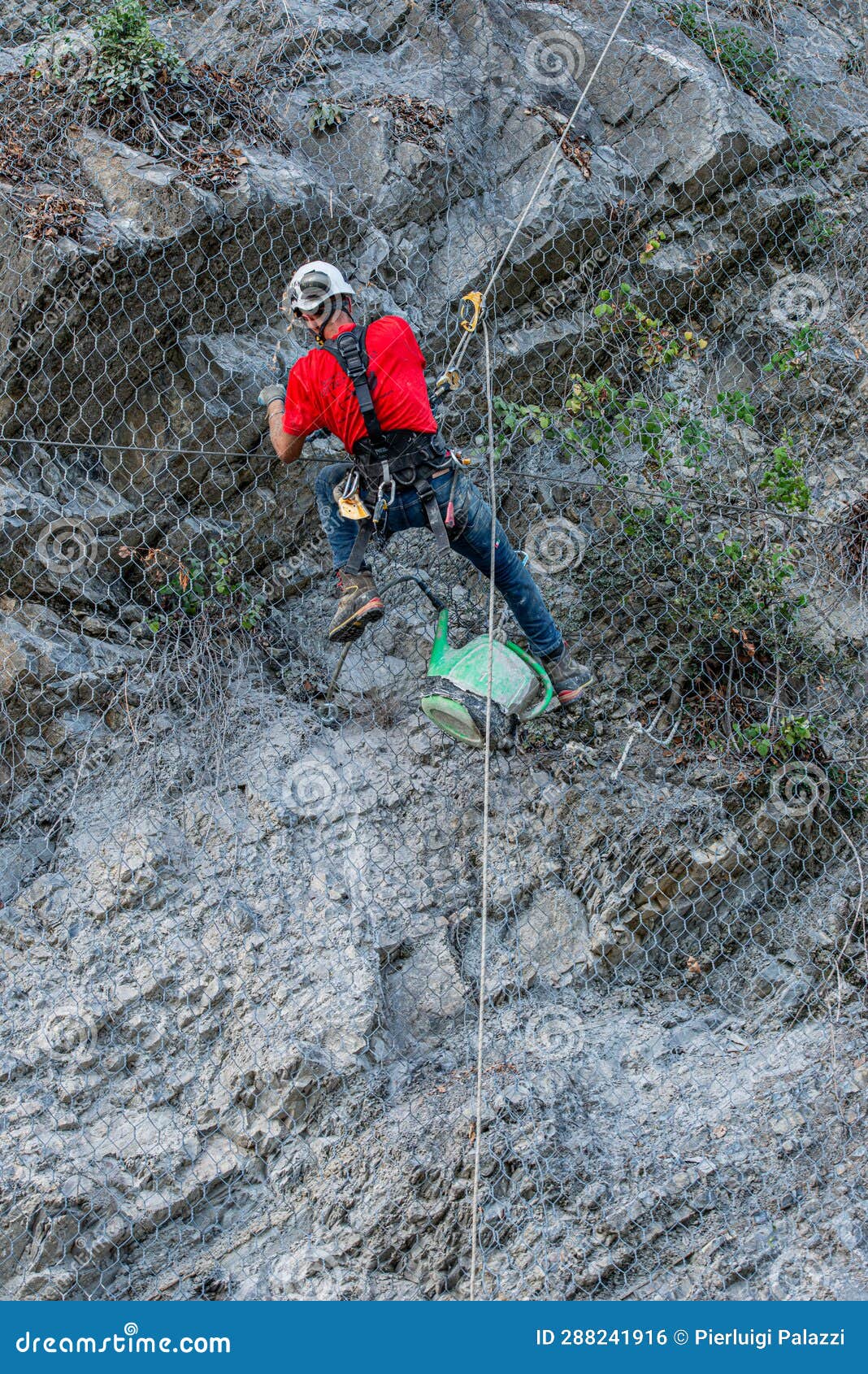 Climber Placing Safety Nets To Avoid Falling Rocks Editorial Image ...