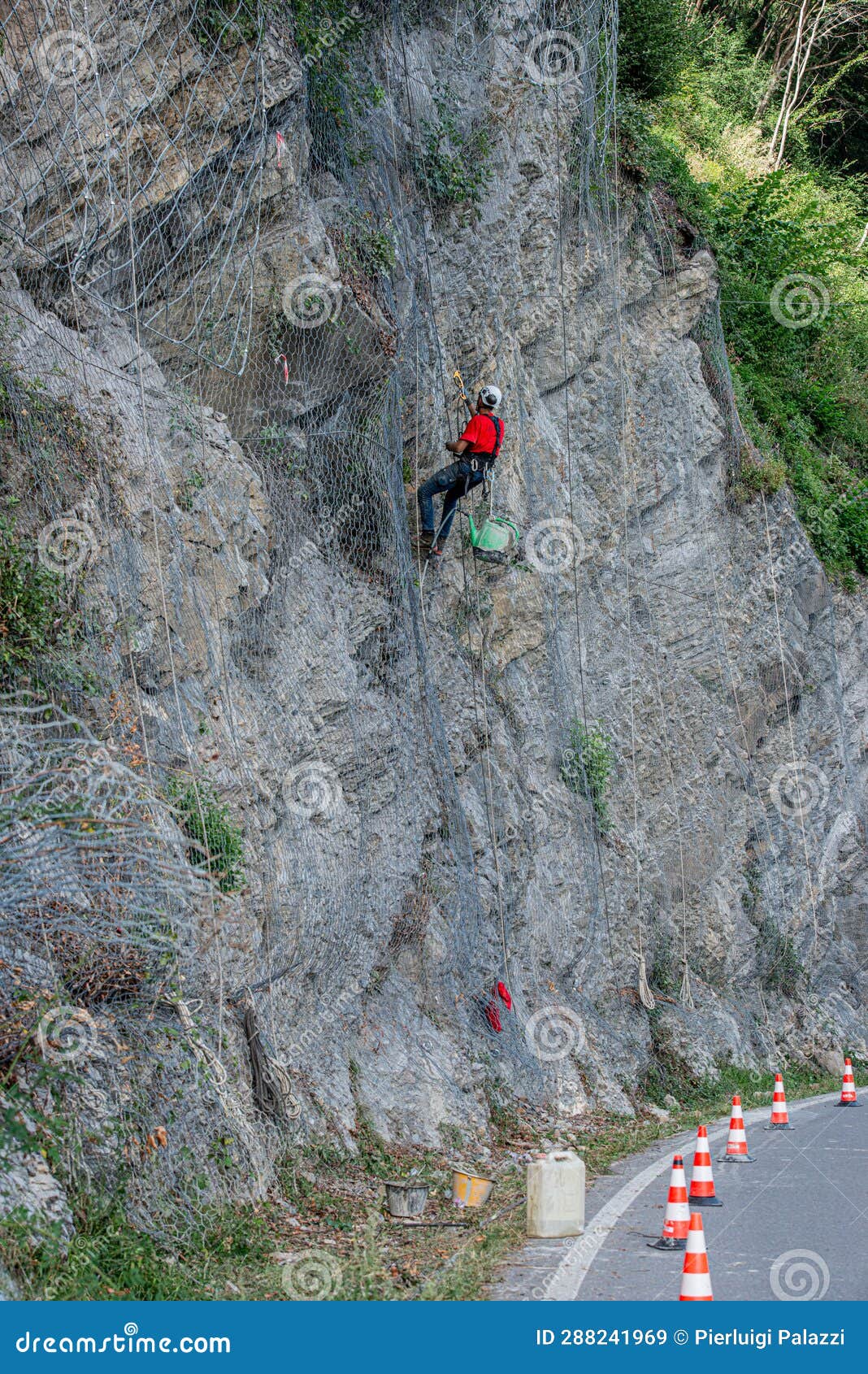 Climber Placing Safety Nets To Avoid Falling Rocks Editorial Stock ...