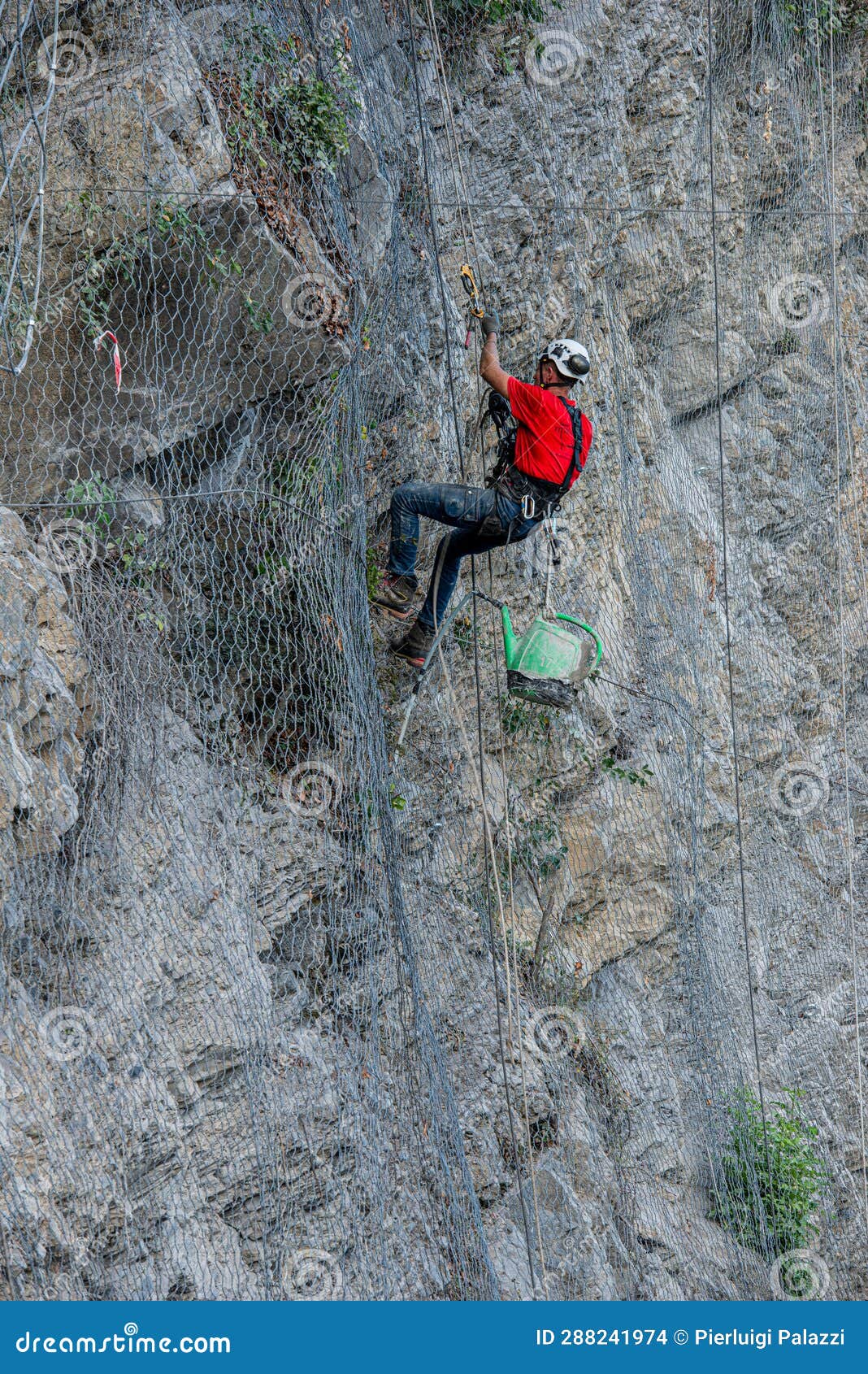 Climber Placing Safety Nets To Avoid Falling Rocks Editorial Image ...