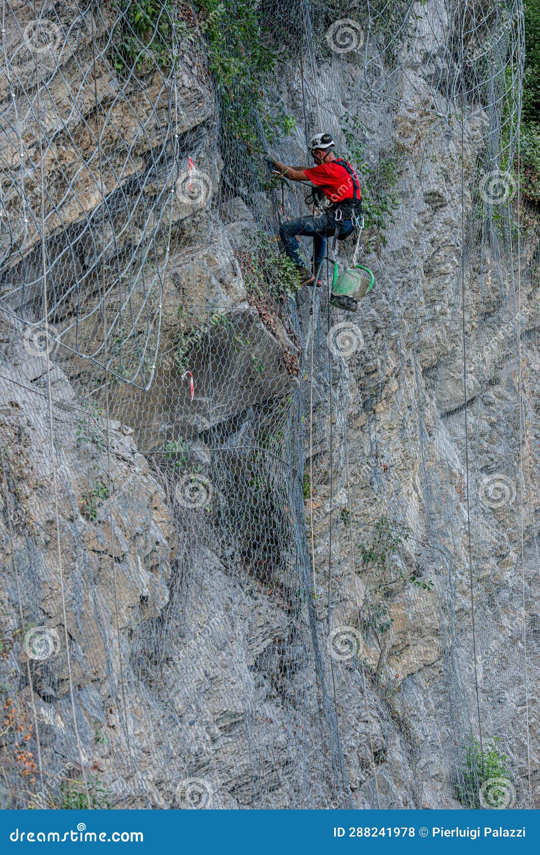 Climber Placing Safety Nets To Avoid Falling Rocks Editorial Image ...