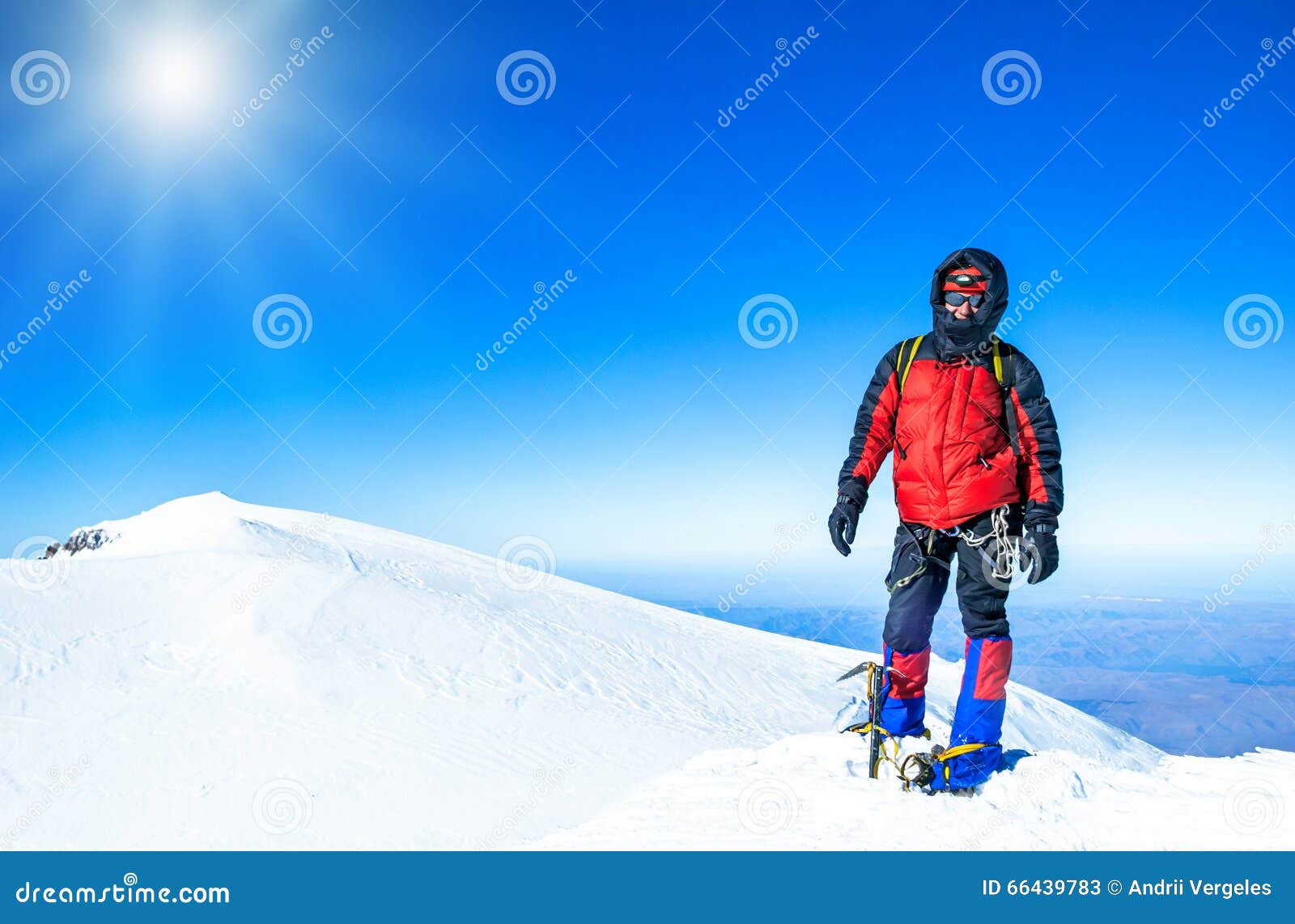 A Climber Reaching the Summit of the Mountain Stock Image - Image of ...
