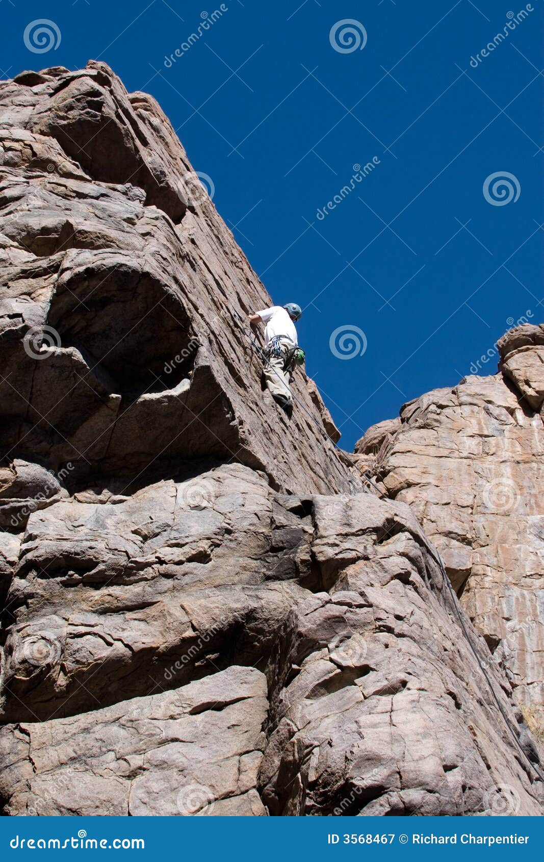 Climber Reaching Top of Climb Stock Image - Image of climbing ...