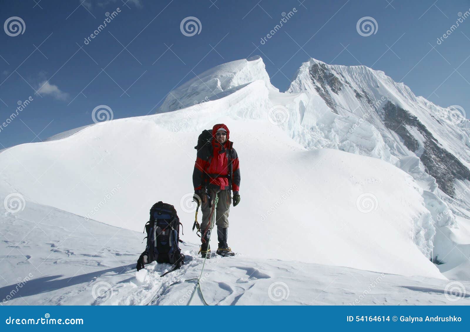 Climber on the summit stock photo. Image of cordillera - 54164614