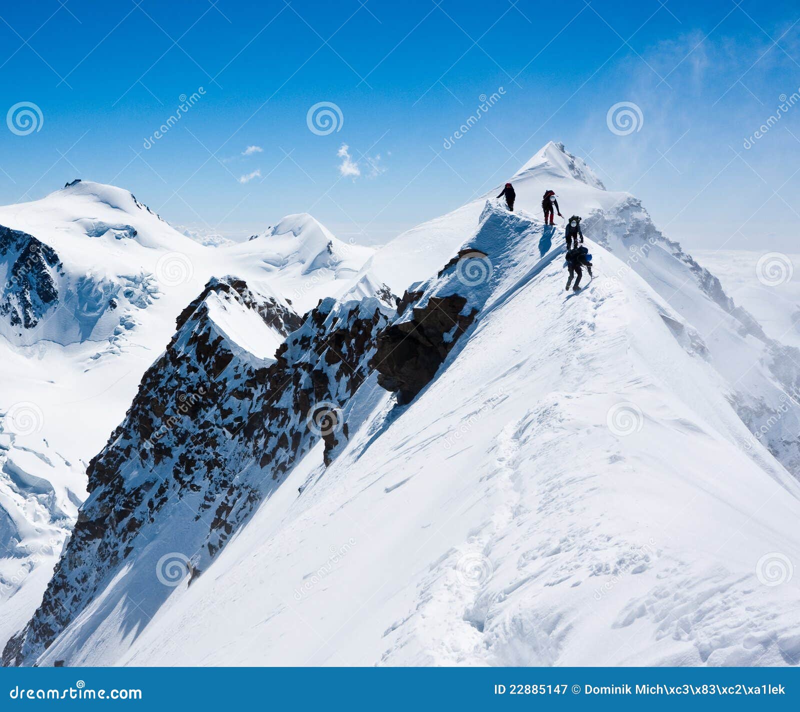 Climbers on a narrow ridge stock image. Image of nature - 22885147