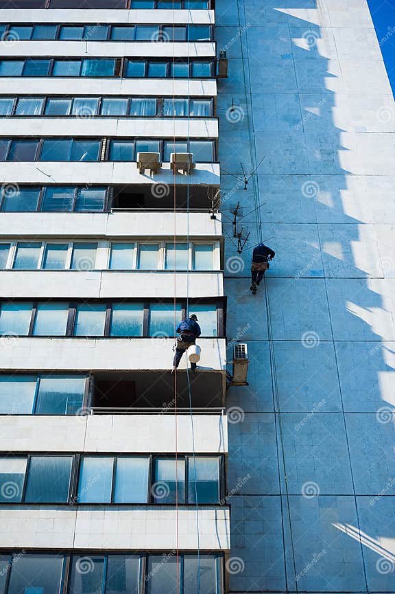 Climbers Perform Construction Work Stock Image - Image of hanging, wall ...