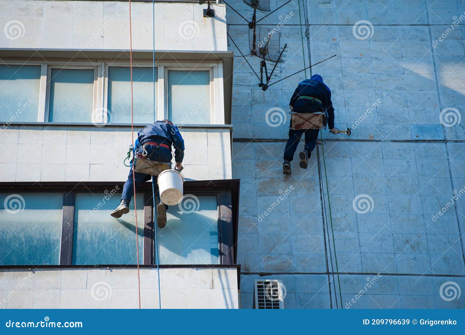 Climbers Perform Construction Work Stock Image - Image of climbing ...