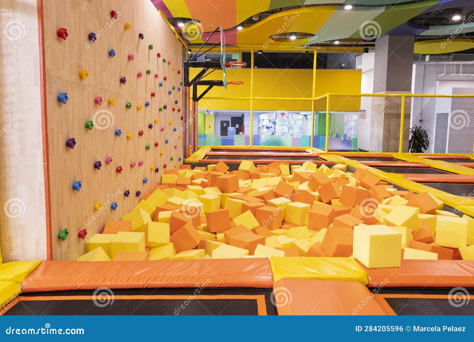 Climbing Challenges and Endless Fun at the Climbing Wall Stock Photo ...