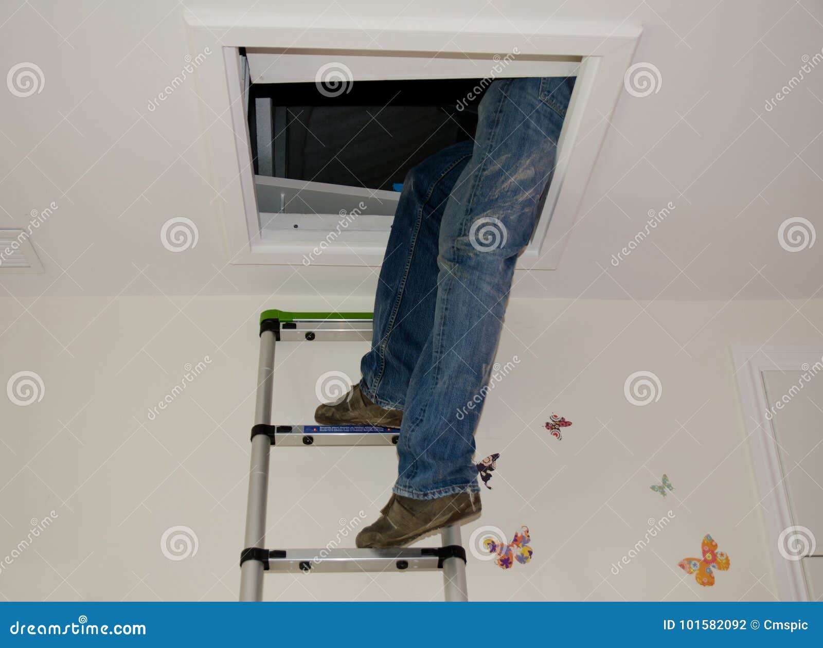 Climbing into the loft stock photo. Image of climbing - 101582092