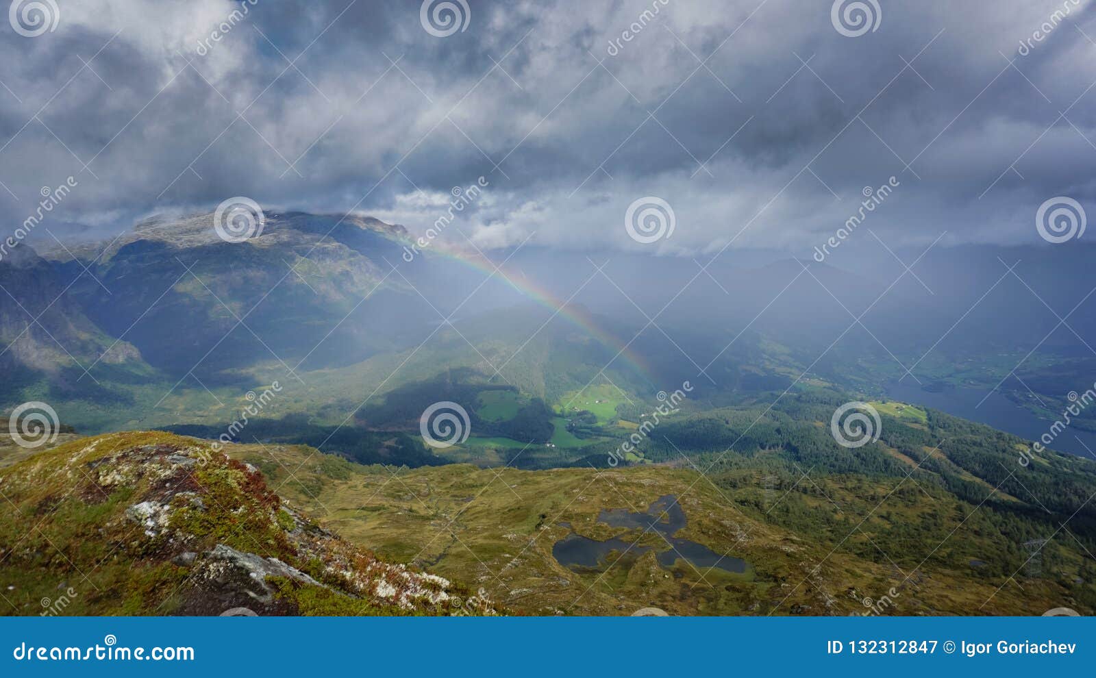 Distant Rainbow in the Mountains of Norway Stock Image - Image of ...