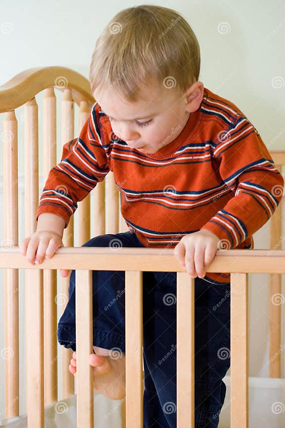 Climbing out of crib stock photo. Image of danger, safety - 7521098