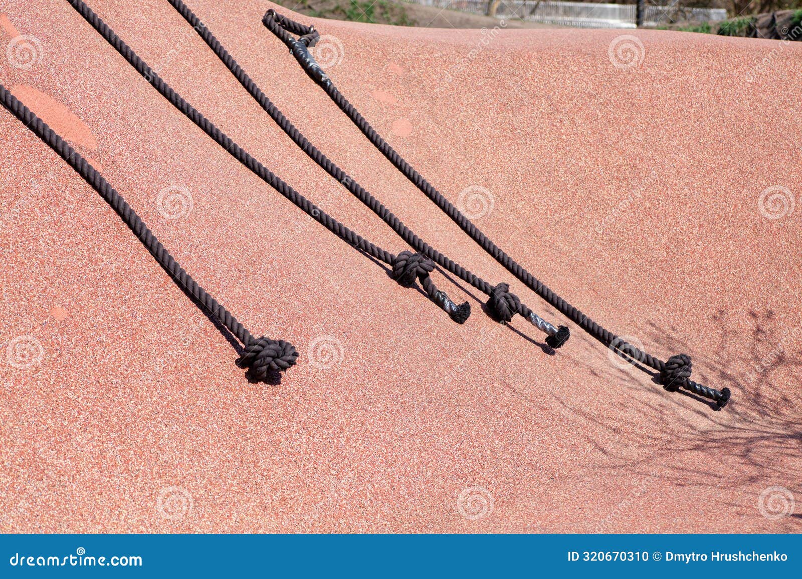 Climbing Ropes with Handles on a Playground Structure in Bright ...