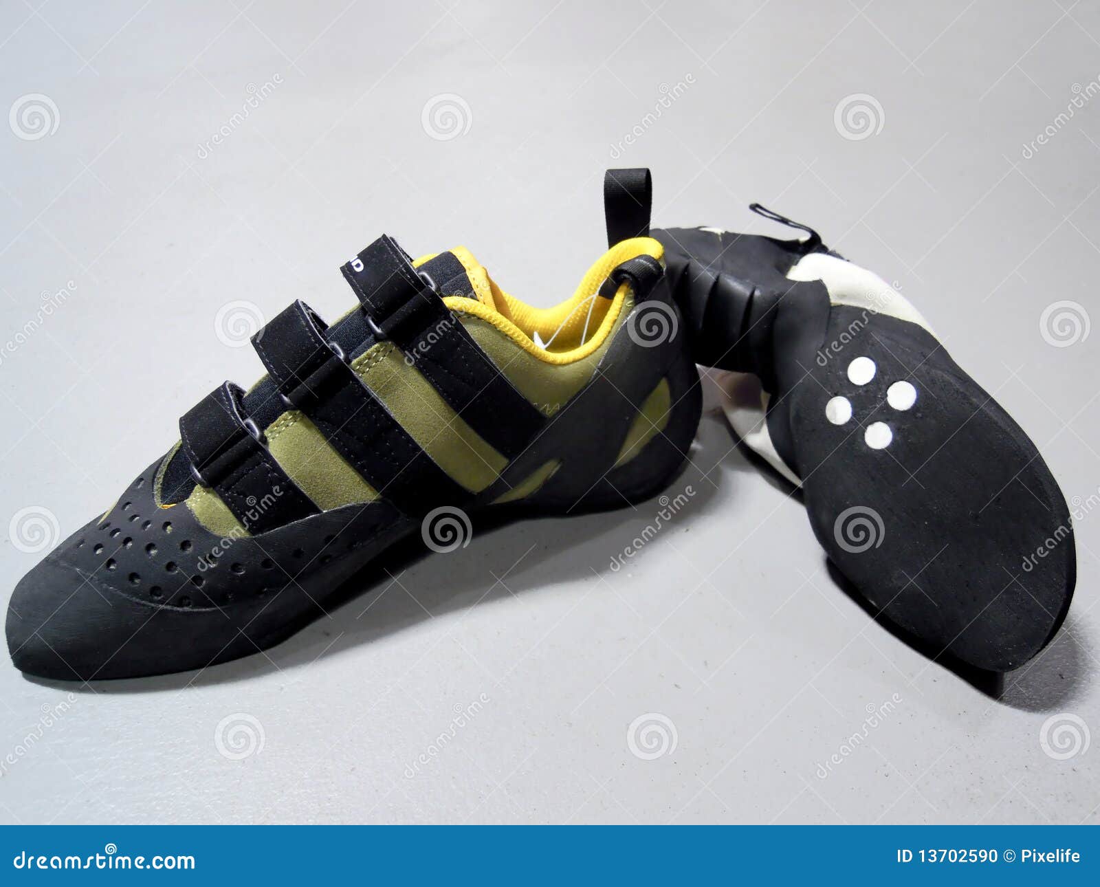 Climbing Shoes On The Feet Of A Climber During A Rest At The Top After ...