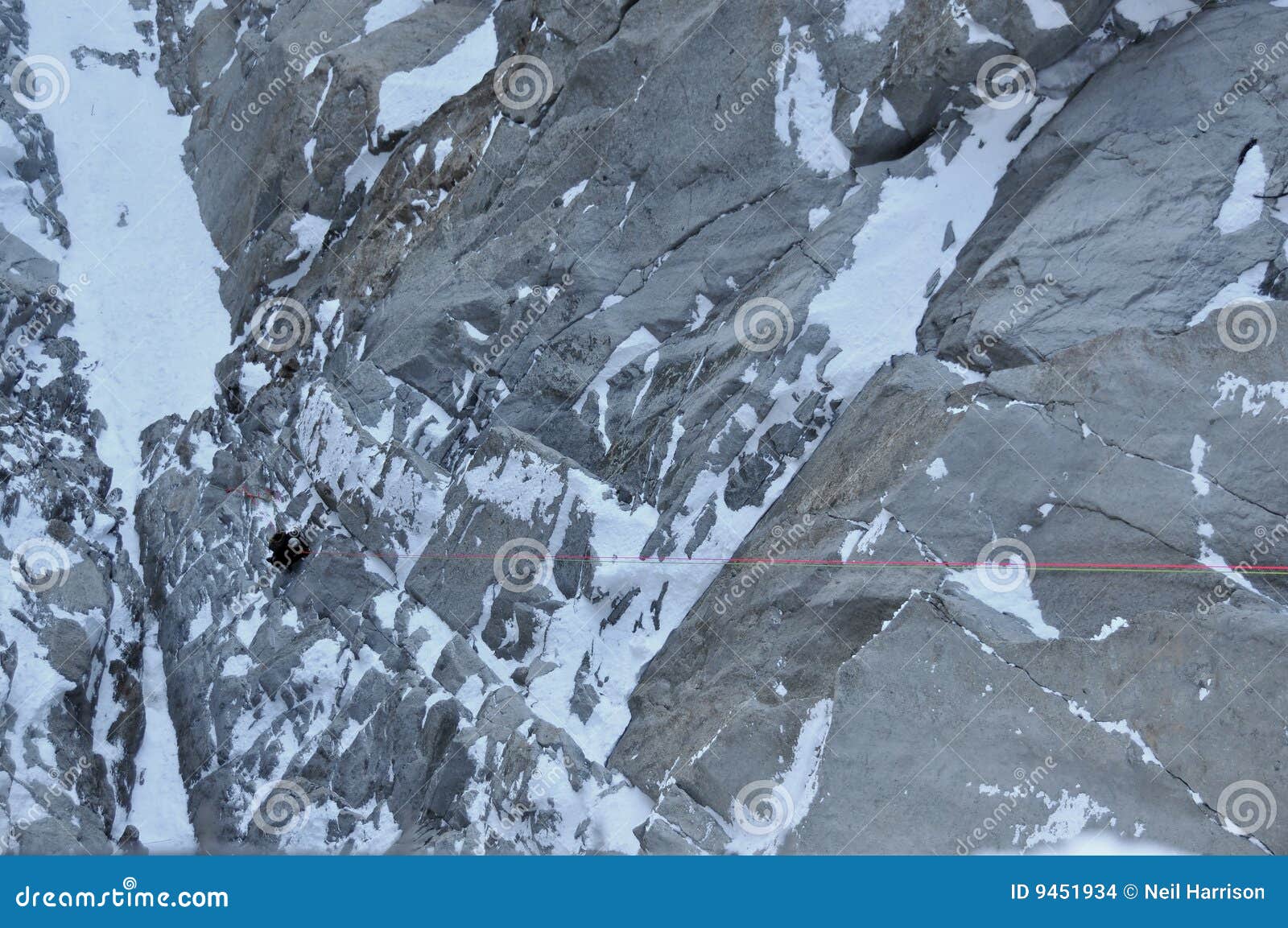 Climbing on a Snow Covered Rock Face Stock Photo - Image of sporting ...