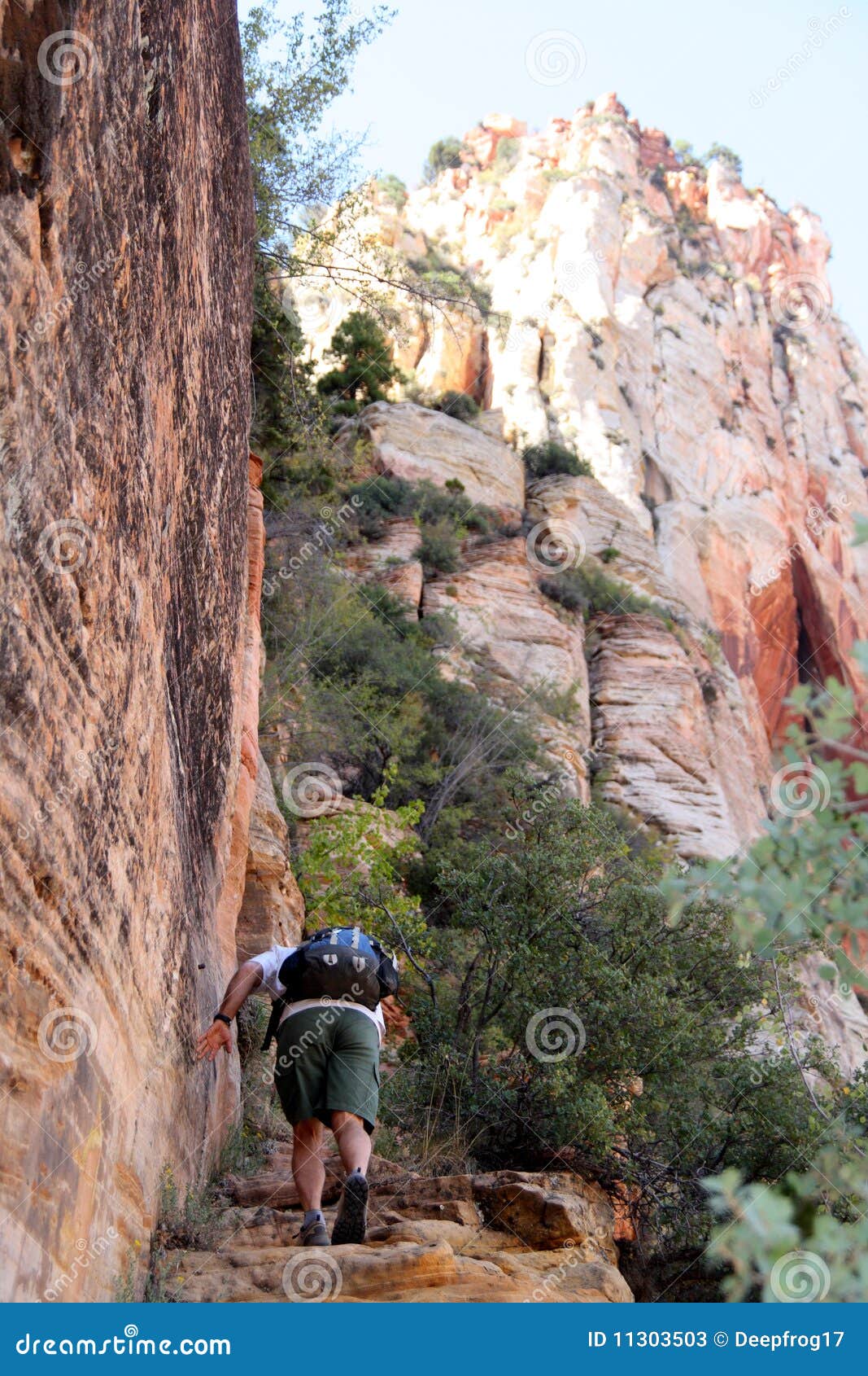 Climbing steep cliffs stock image. Image of explorer - 11303503
