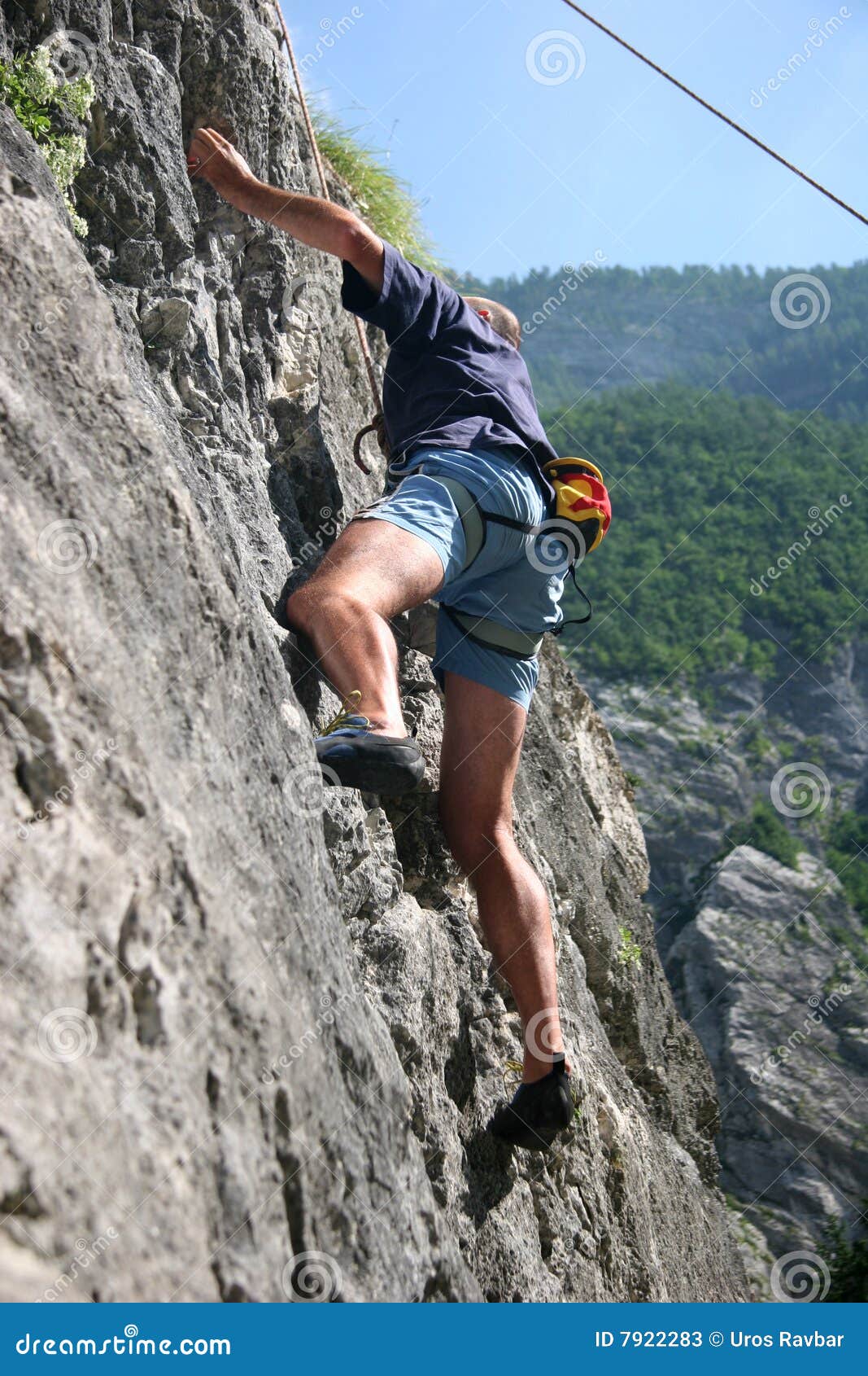 Climbing up a cliff stock image. Image of mountaineer - 7922283