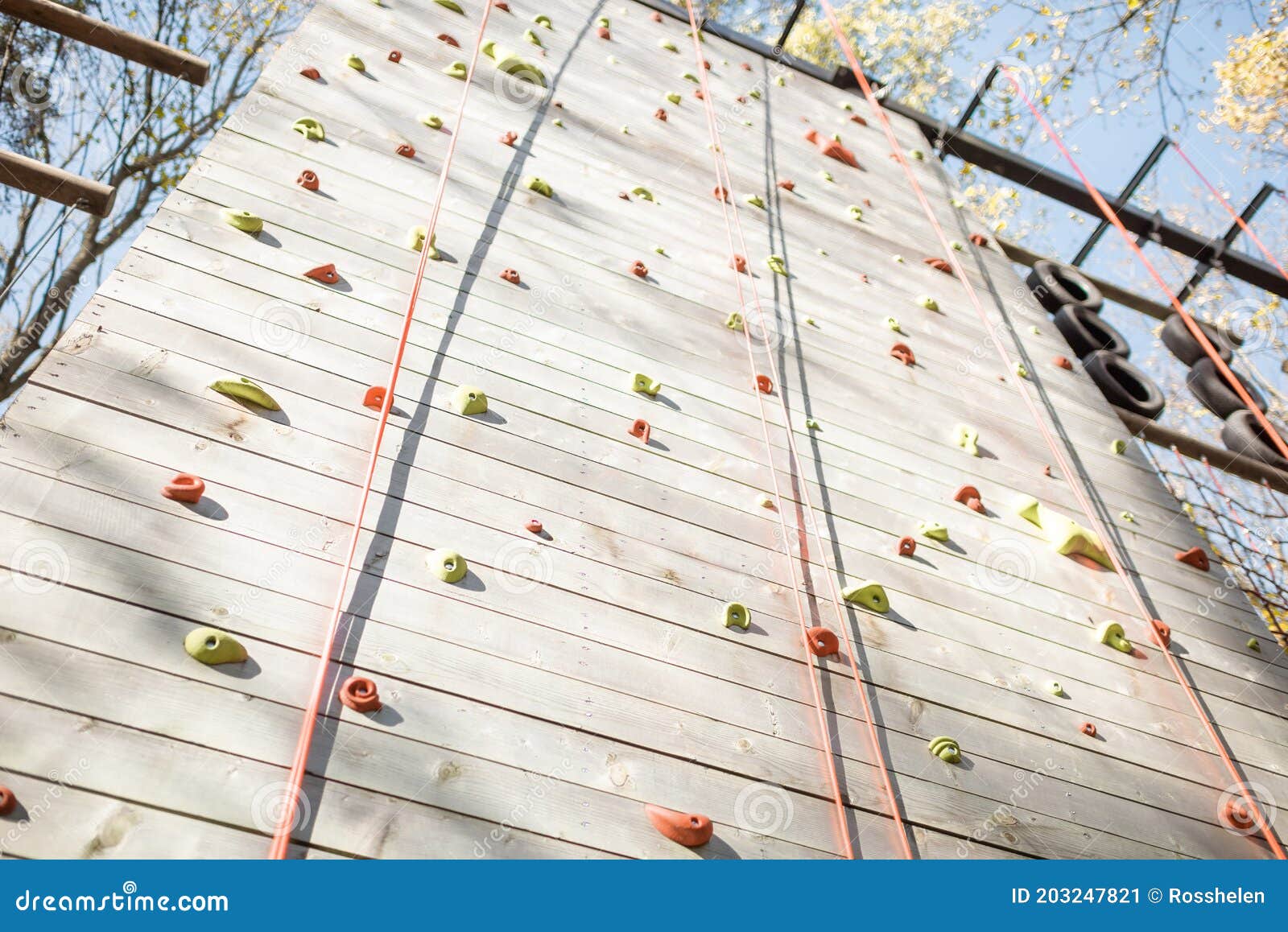 Climbing Wall at Amusement Park Stock Image - Image of color, holds ...