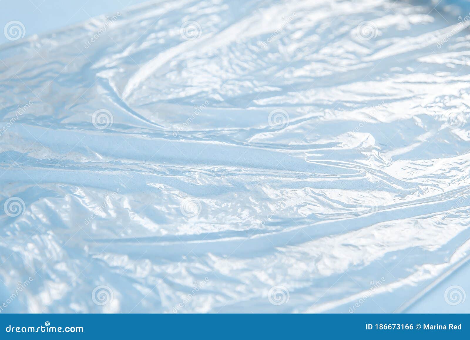 Cling Film on a Blue Background. Stock Photo - Image of plastic, food ...