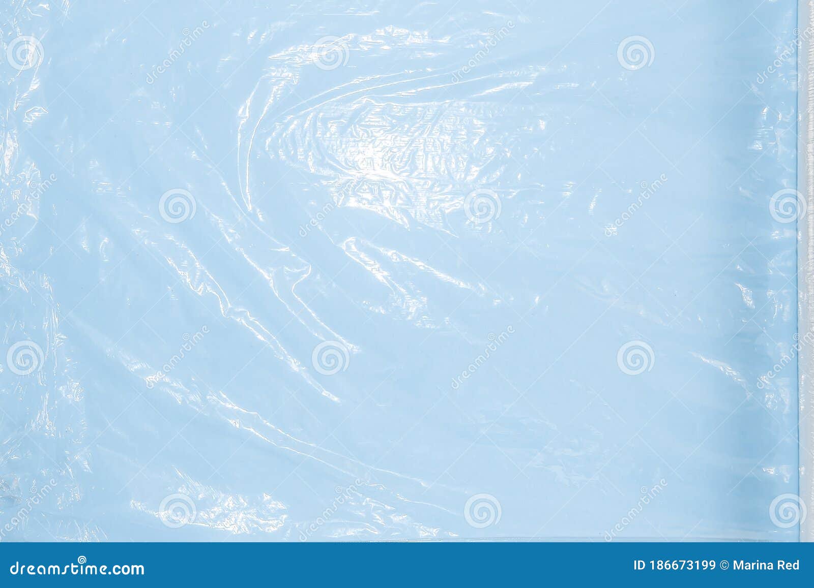 Cling Film on a Blue Background. Stock Image - Image of protection ...