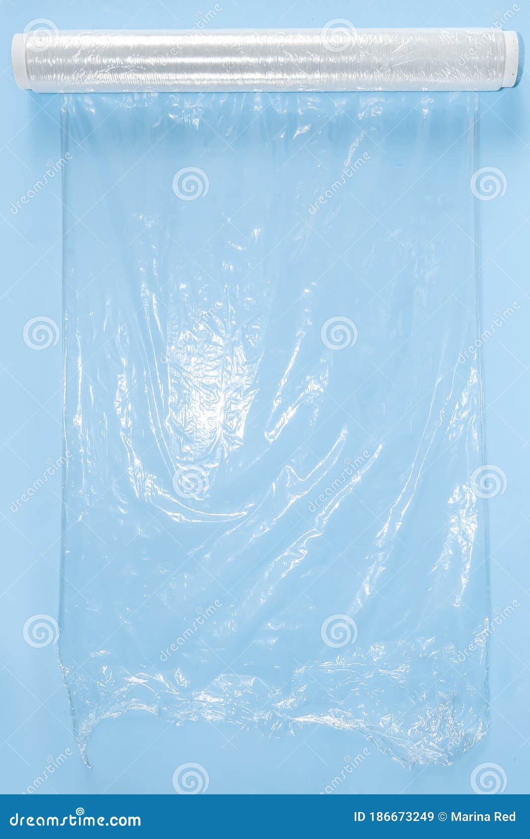 Cling Film on a Blue Background. Stock Image - Image of beautiful ...