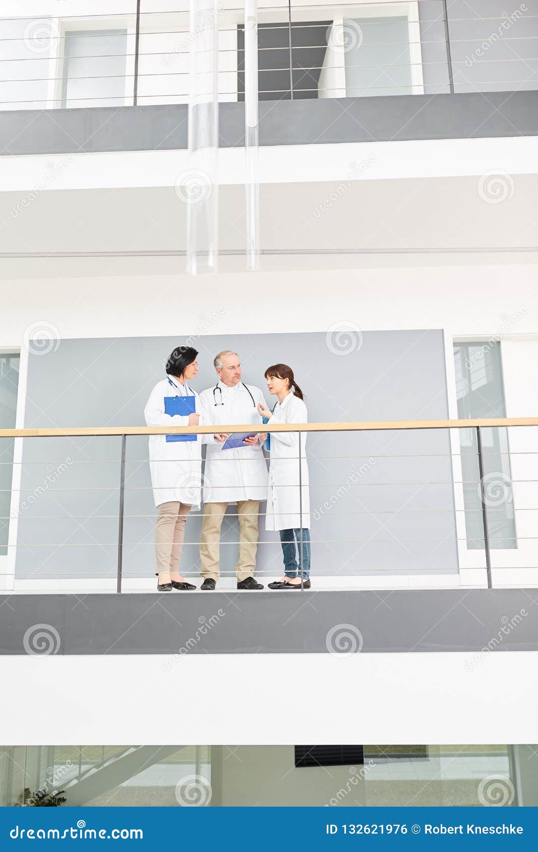 Clinic Team of Doctors Discuss in Cooperation Stock Photo - Image of ...