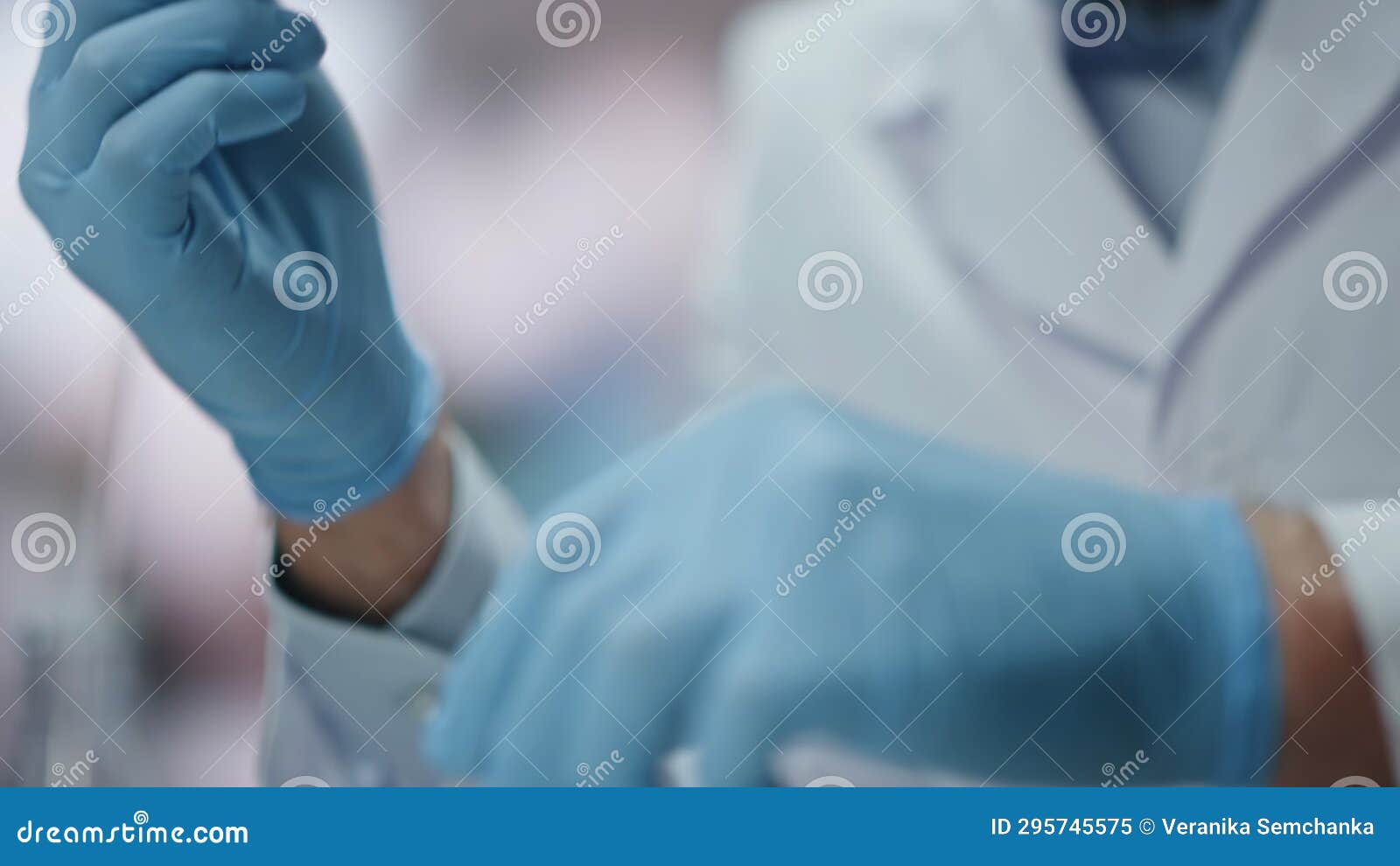 Clinic Worker Analyzing Sample Experimental Substance in Test Tube ...