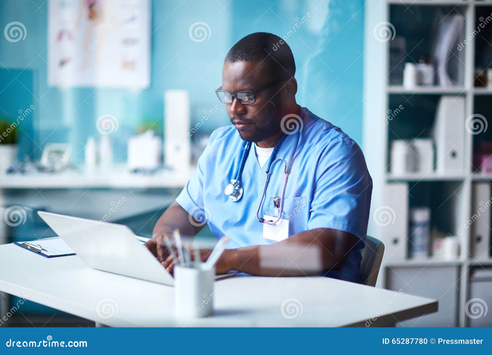 Clinician Working in Hospital Stock Photo - Image of serious, clinician ...