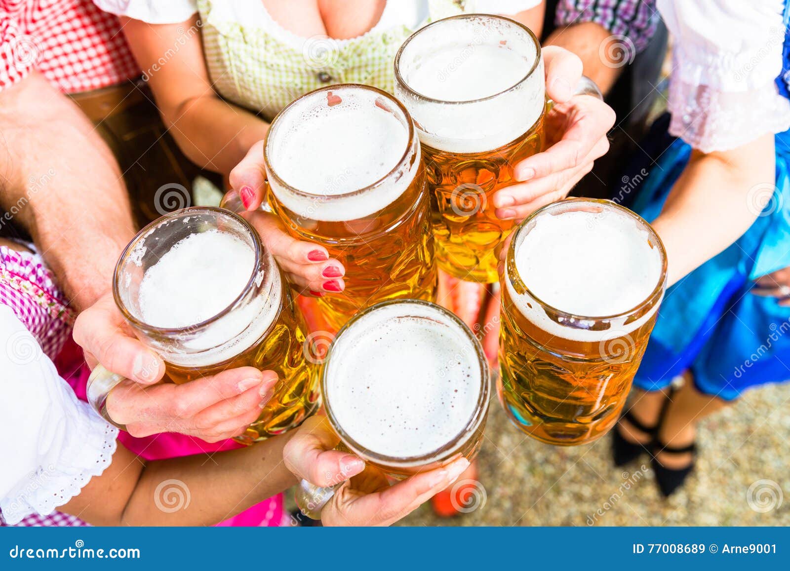 Clinking Glasses with Beer in Bavarian Beer Garden Stock Image - Image ...
