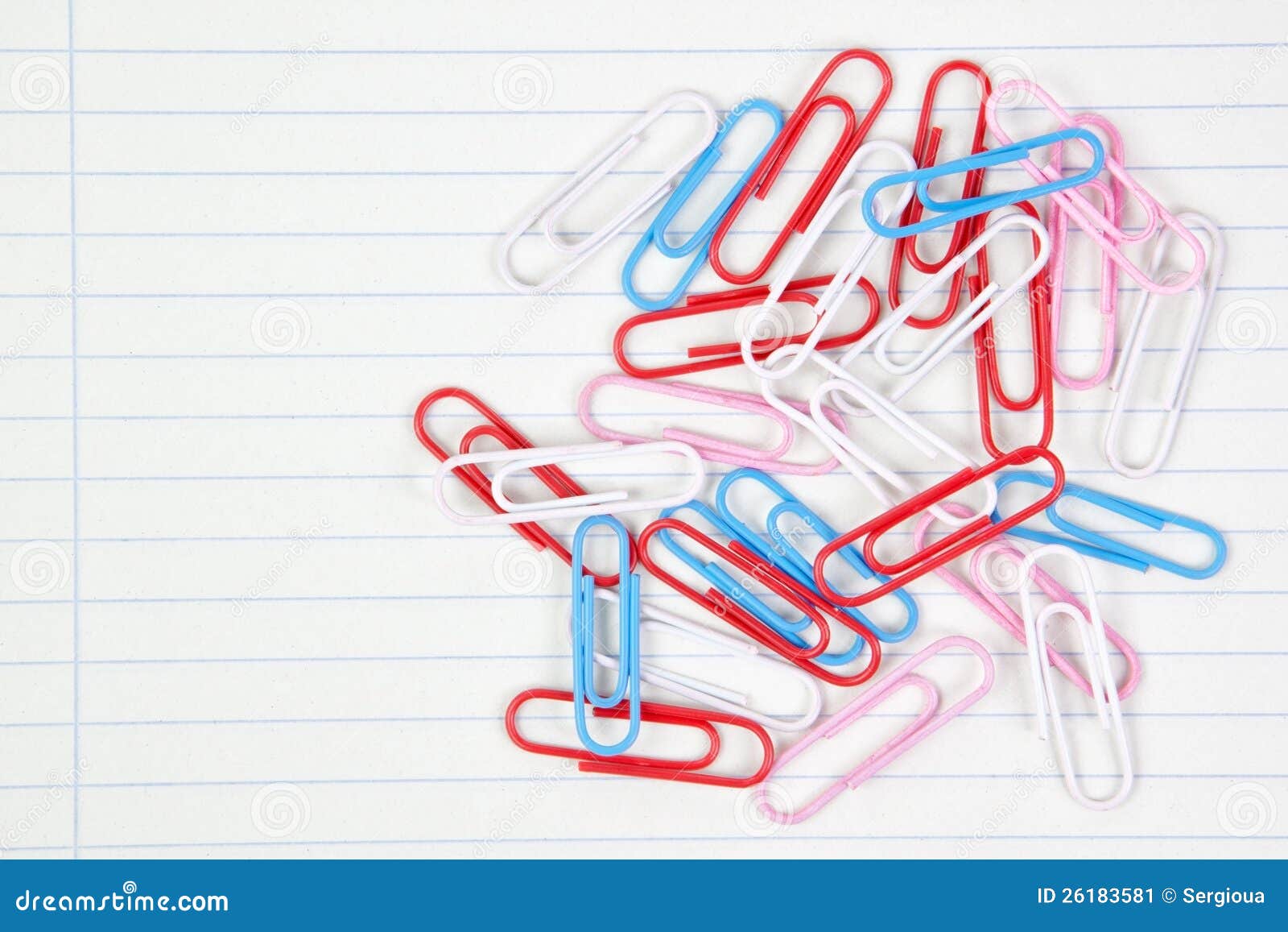 Clip on a sheet of paper. stock image. Image of color - 26183581