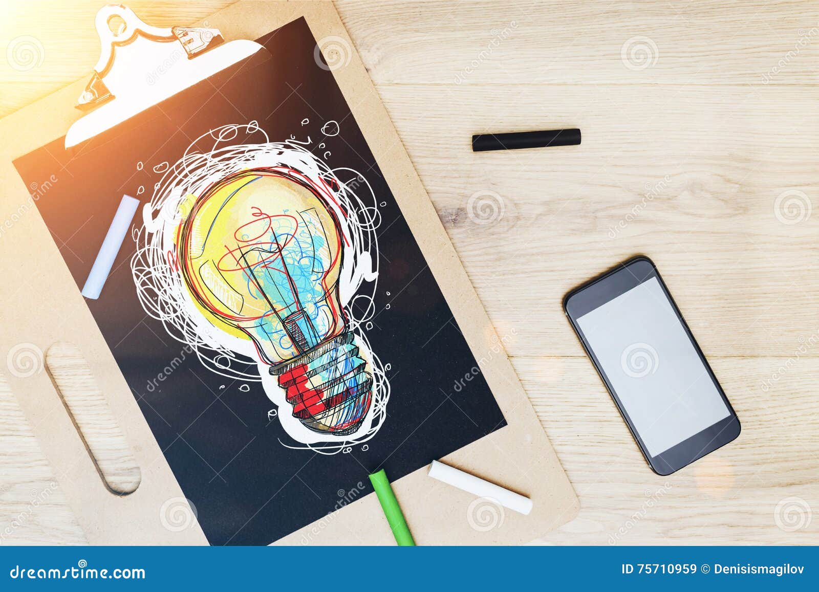 Clipboard with Light Bulb and Cell Phone Stock Image - Image of chalk ...