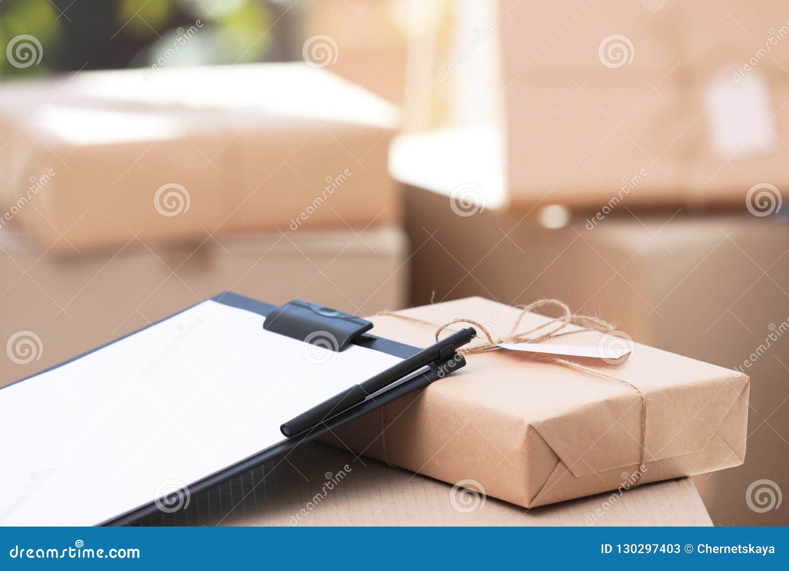 Parcel With Tag And Blurred Stacked Boxes Royalty-Free Stock Image ...