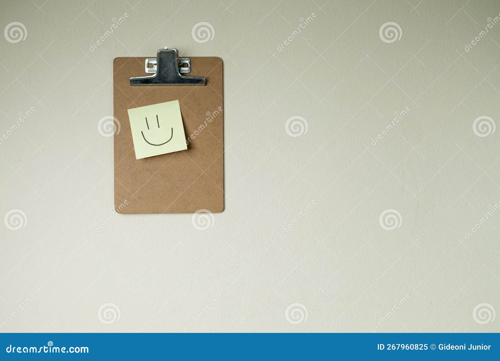 Clipboard with Post it Notes and Smile on the Wall. Stock Image - Image ...