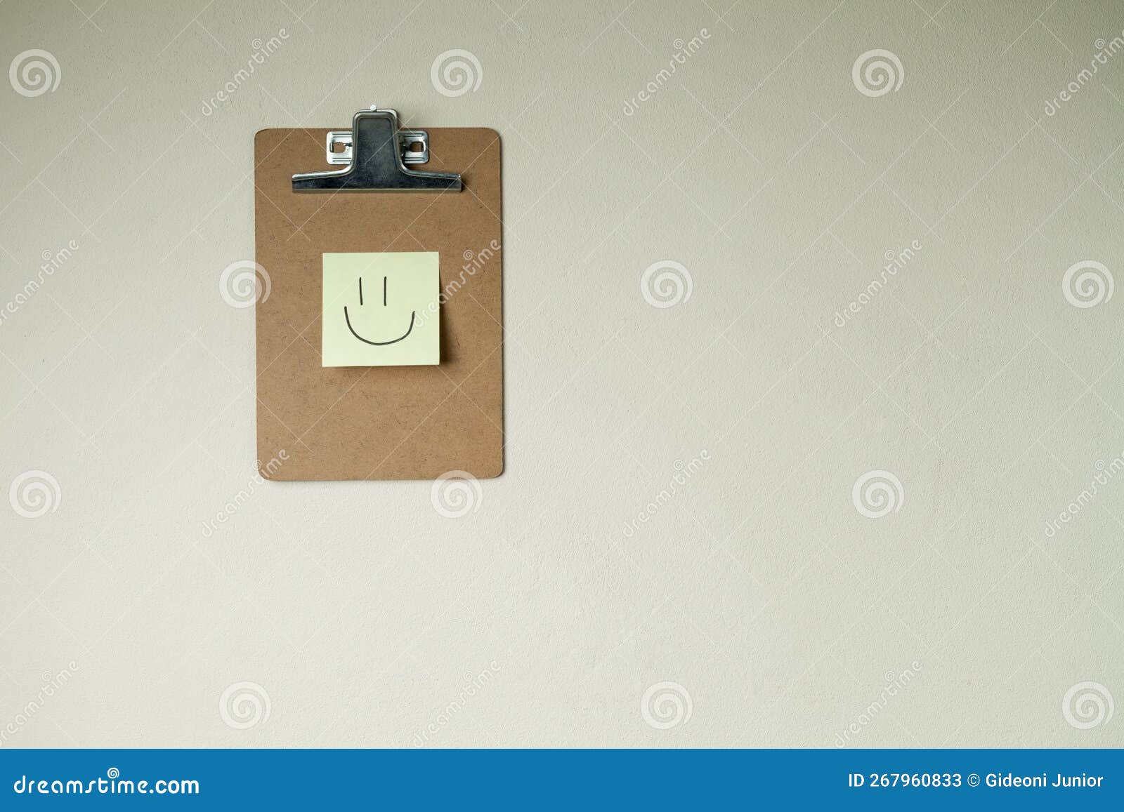 Clipboard with Post it Notes and Smile on the Wall. Stock Image - Image ...