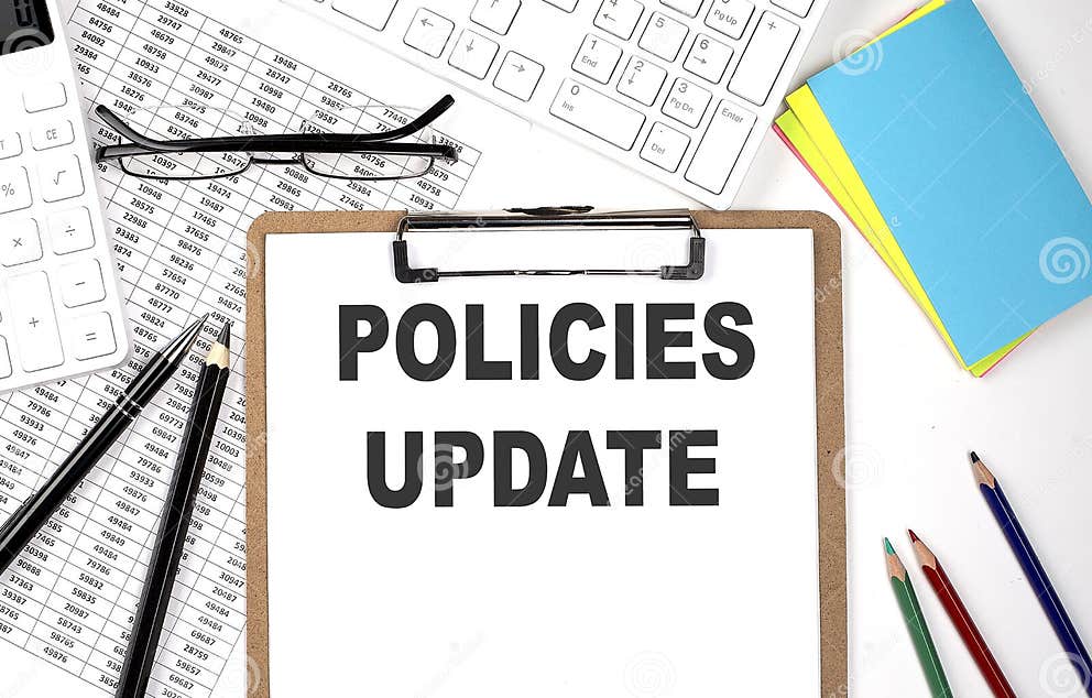 Clipboard with Text POLICIES UPDATE and Keyboard and Chart on White ...