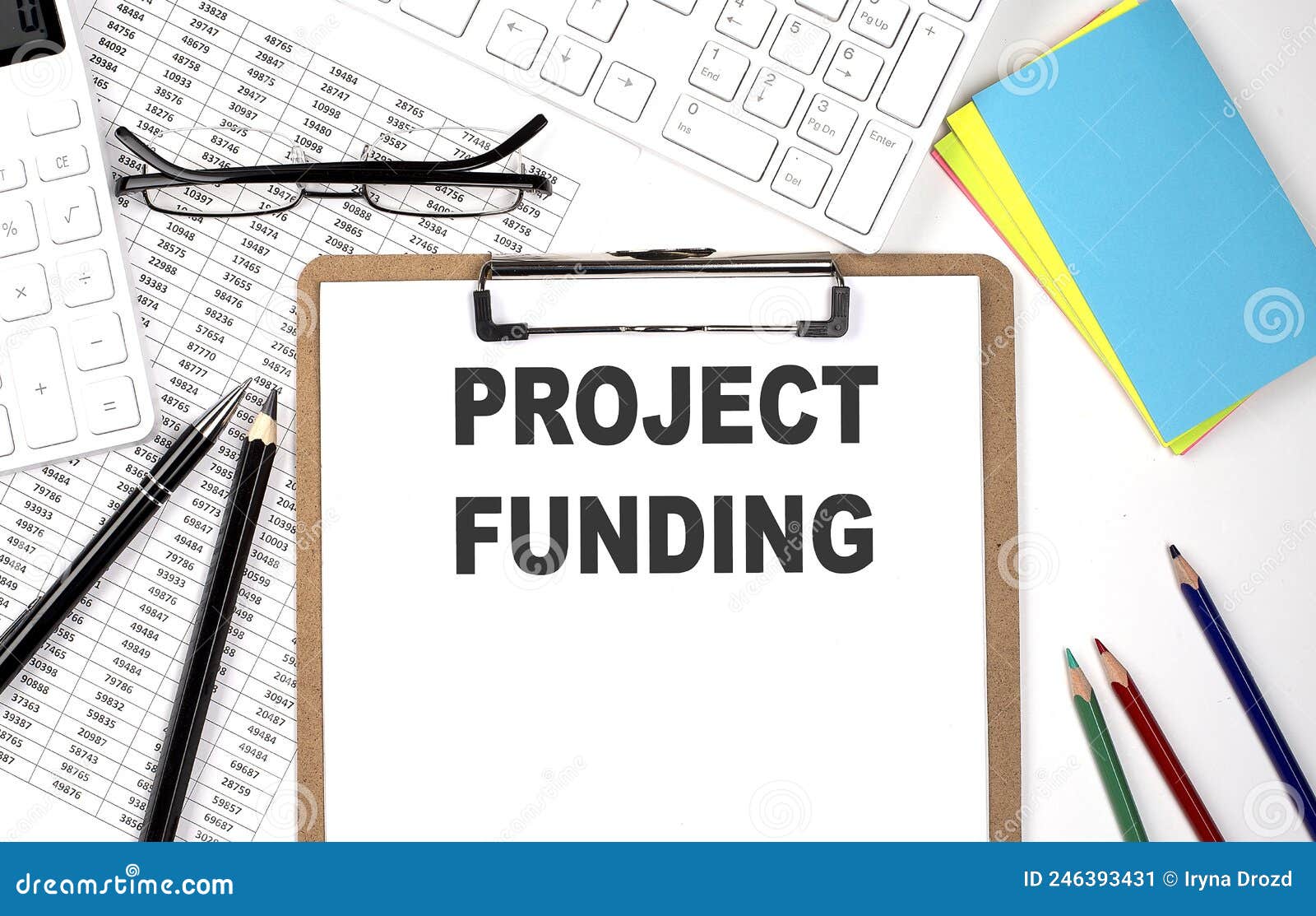 Clipboard with Text PROJECT FUNDING and Keyboard and Chart on the White ...