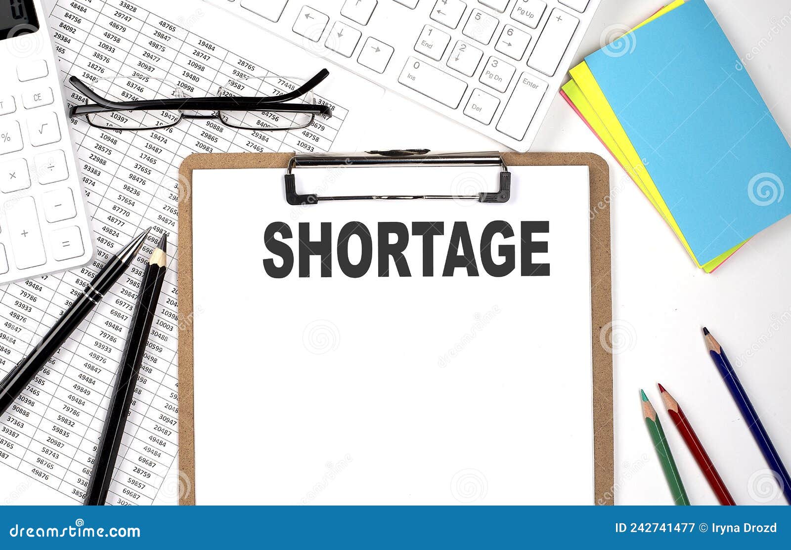Clipboard with Text SHORTAGE Keyboard and Chart on White Background ...