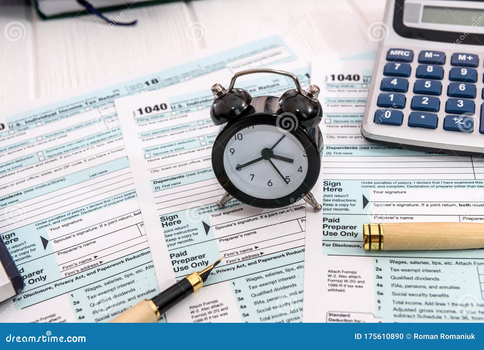 Clock with Alarm on 1040 Tax Form Editorial Image - Image of form ...