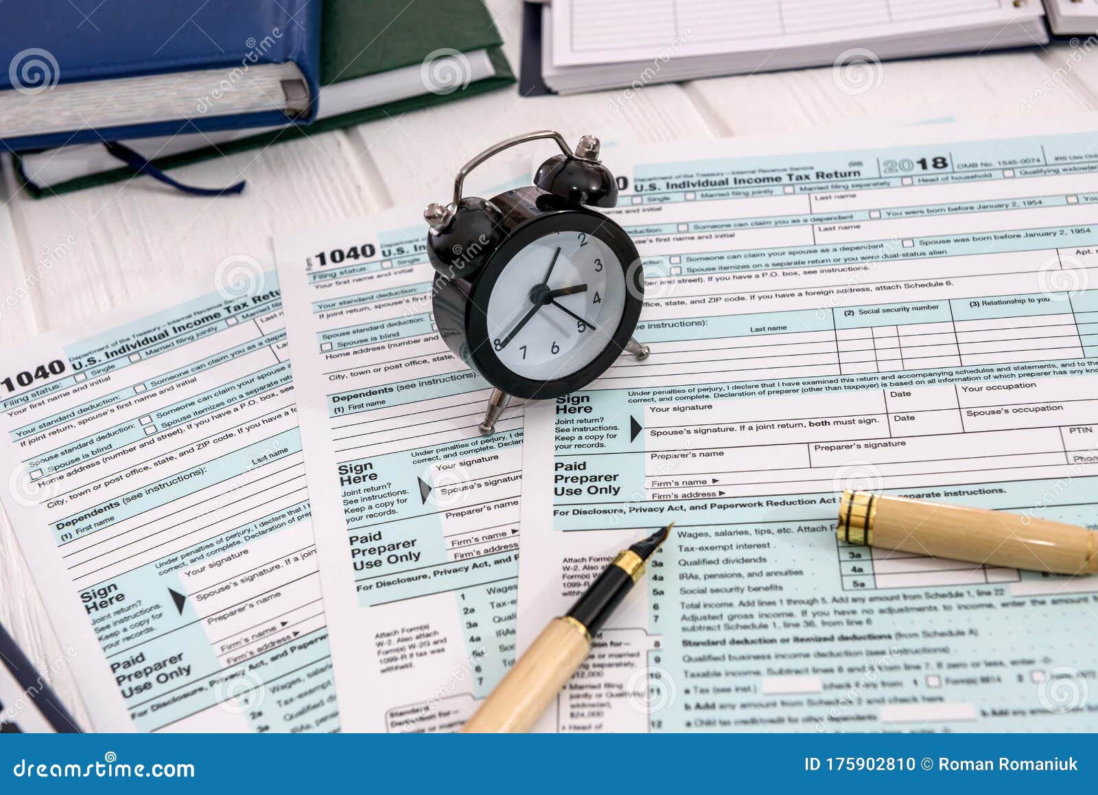 Clock with Alarm on 1040 Tax Form Editorial Image - Image of wealth ...