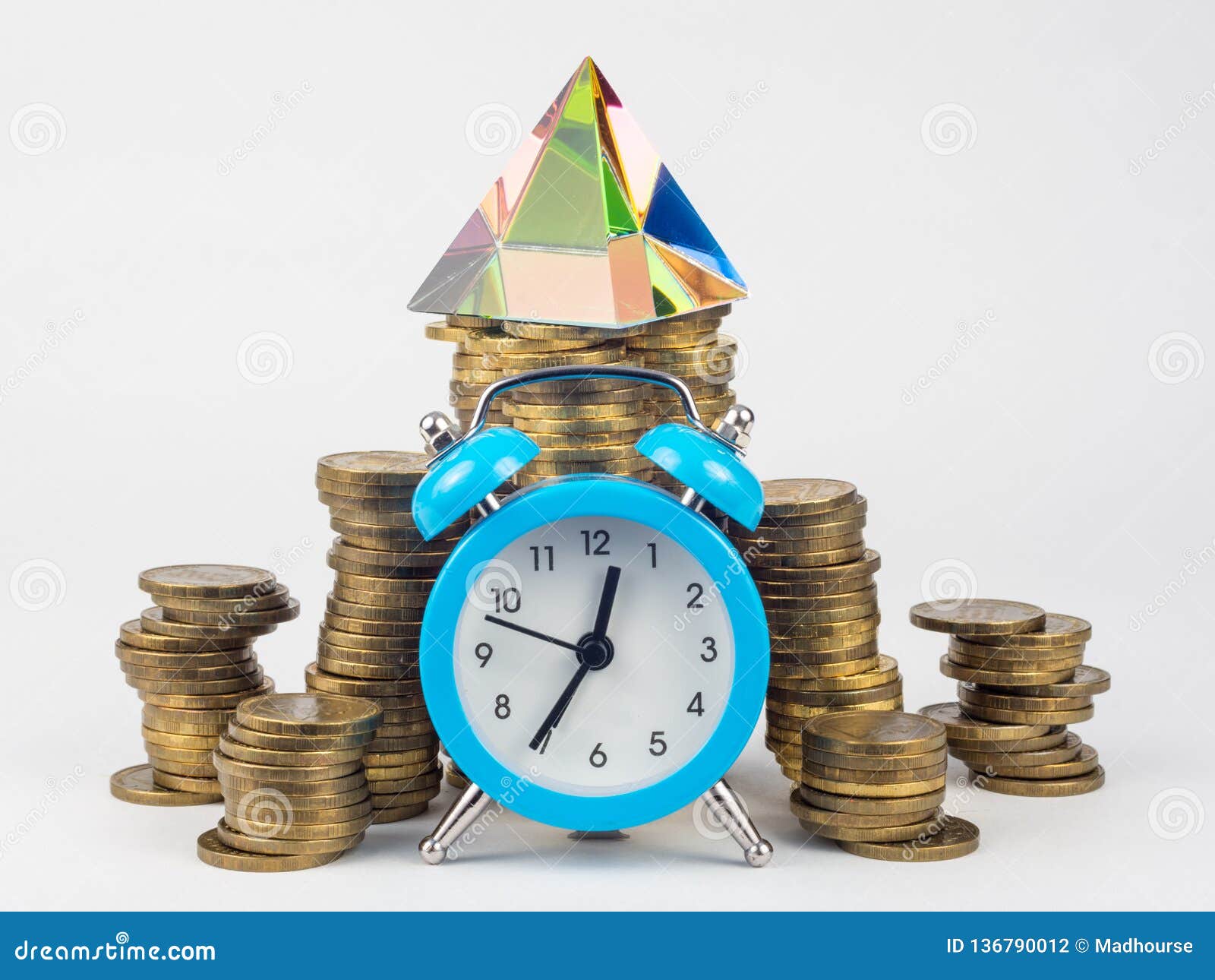 The Clock, Behind Them are Stacks of Coins on Which the Glass Pyramid ...