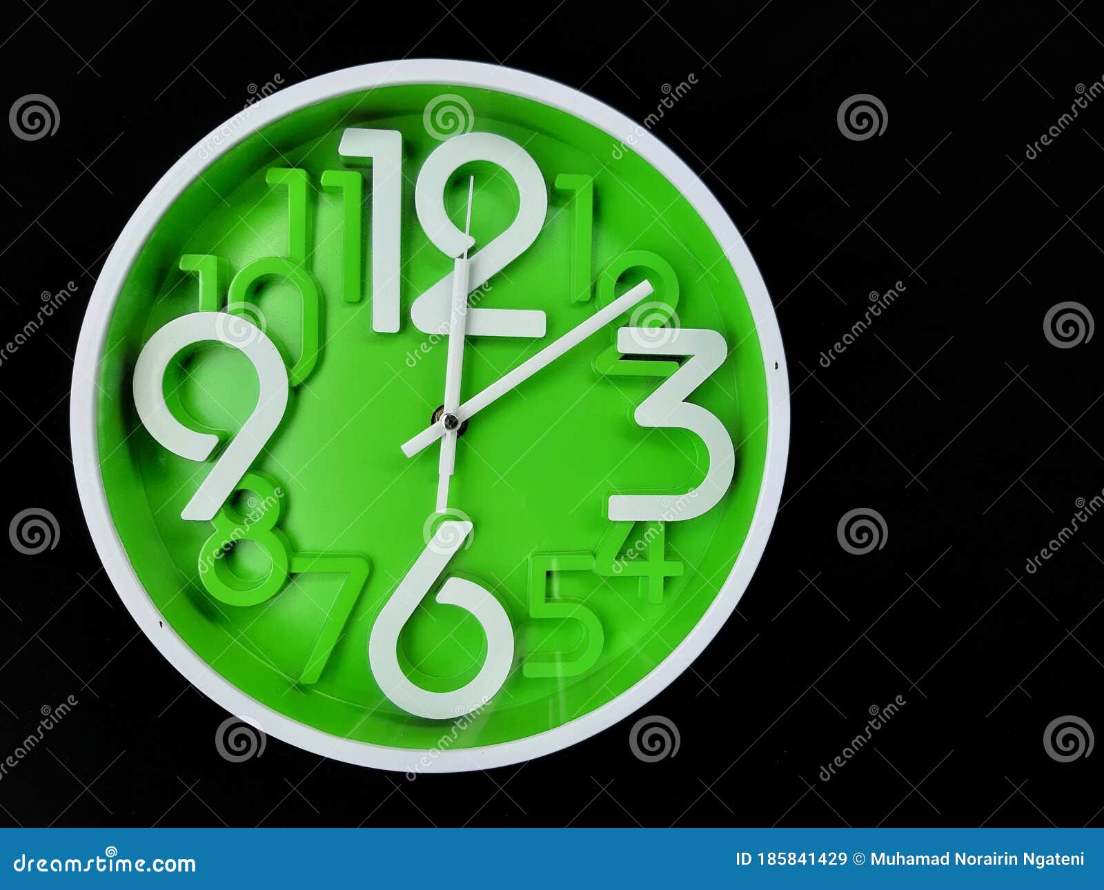 Clock on Black Background. the Time is 12:10 am or Pm. Twelve O'clock ...