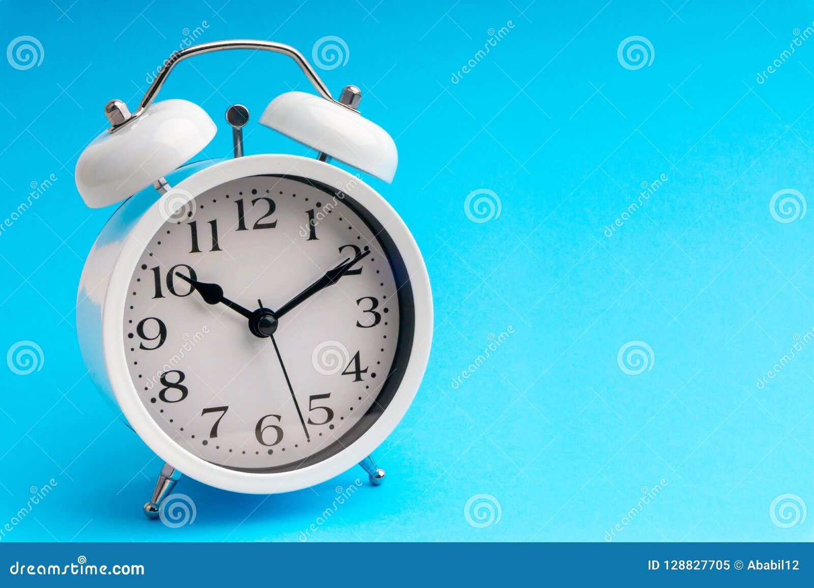 Clock on blue background stock image. Image of fragment - 128827705