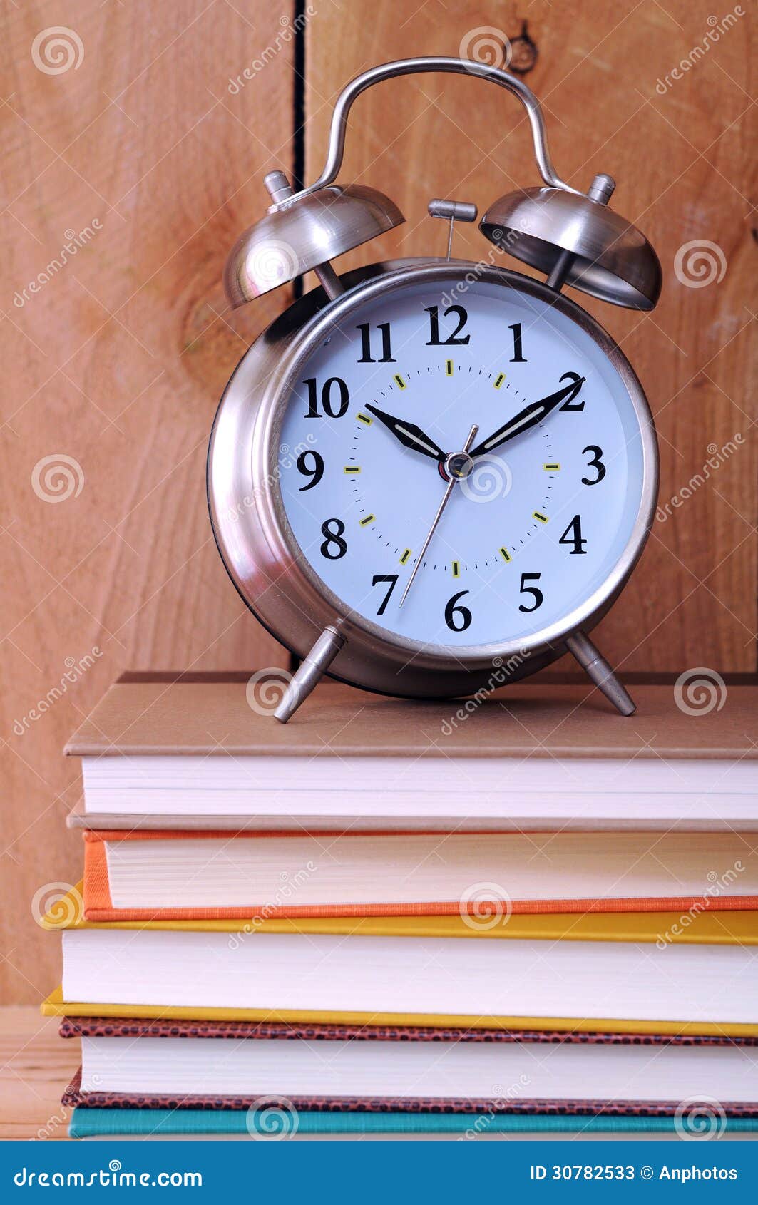 Clock with books stock image. Image of bell, paper, clock - 30782533