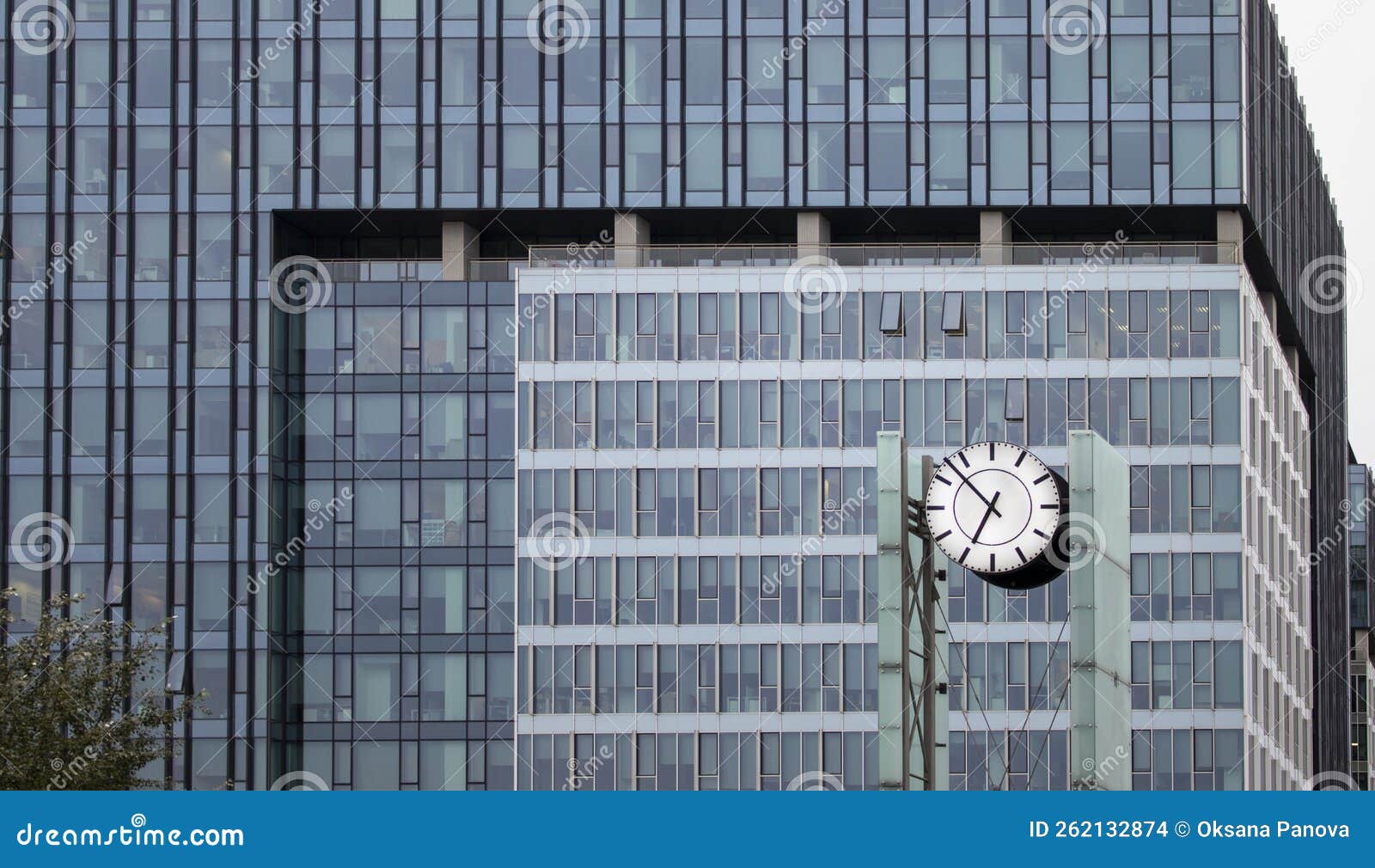 Clock in the Business Center. Clock in Front of an Office Building ...