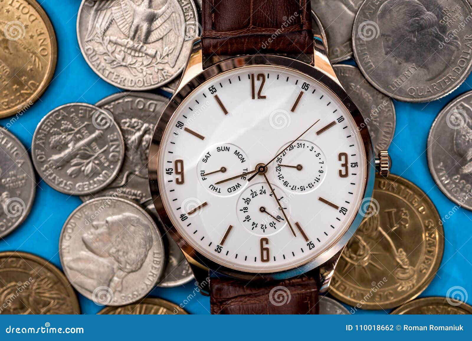 Clock with coins on a blue stock photo. Image of wealth - 110018662