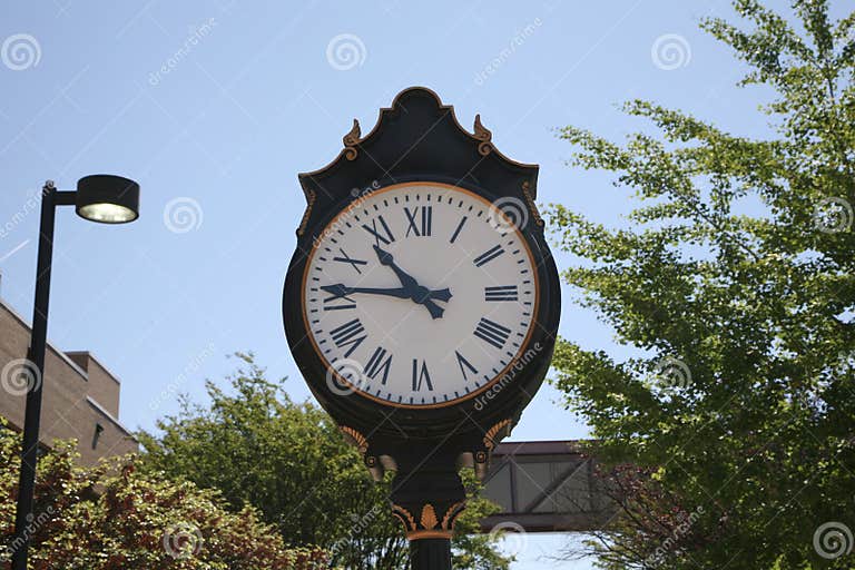 Clock on College Campus stock photo. Image of campuses - 92155196